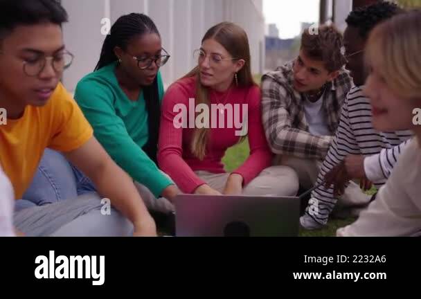 Group diverse Gen z university concentrates students going through ...