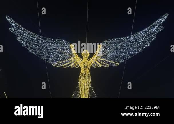 4k footage of hanging christmas decoration installation in fairy or ...