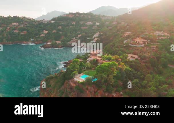Aerial view of the village of Antheor, with the iconic red rocks of the ...