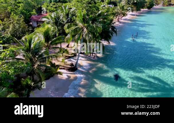 Explore the lush green landscapes and crystal-clear waters of Koh Kood ...