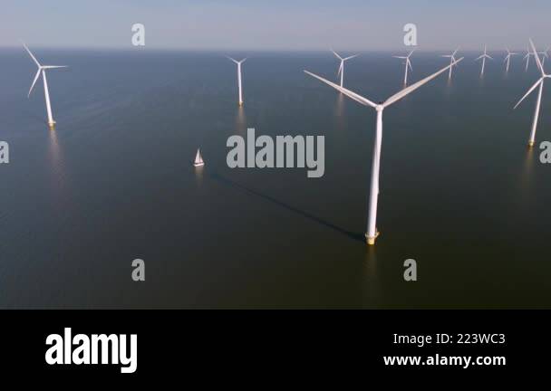 Gentle winds sail across the Dutch landscape adorned with majestic ...