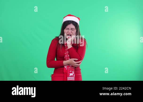 Young ladies in extreme pain expression due to toothache, facing camera ...