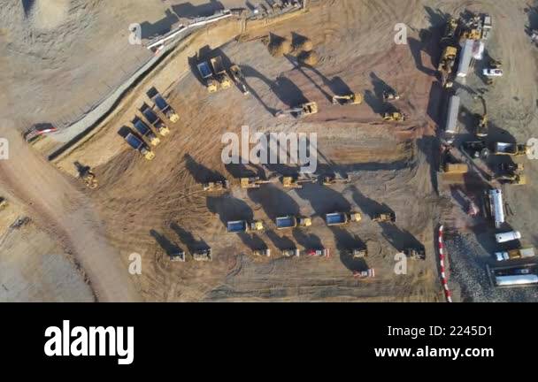 aerial view machinery and heavy-duty equipments at large construction ...