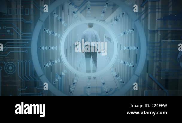 Walking through data center, man surrounded by digital interface ...