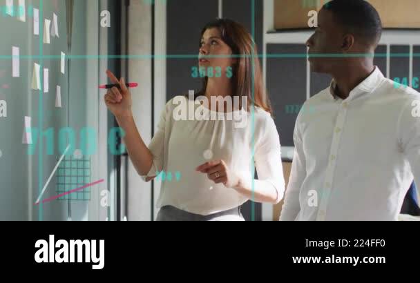Analyzing financial data, business people with bar and line graph ...