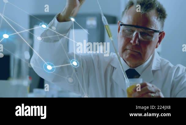 Animation of network of connections over caucasian male scientist working in lab. Global science ...