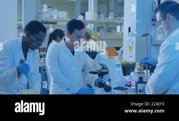 Animation of network of connections over diverse scientists working in lab. Global science ...