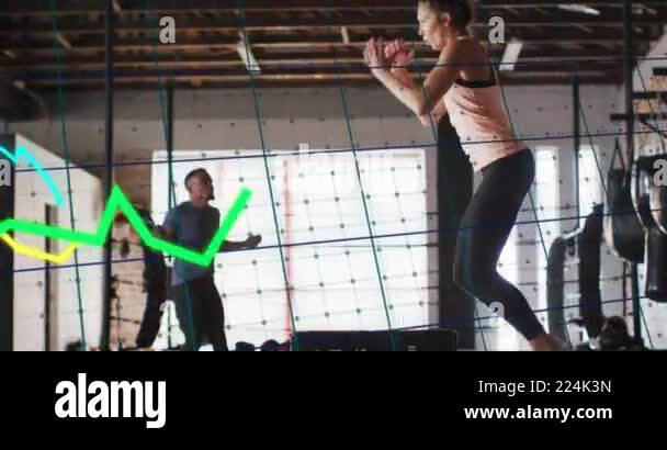 Animation of diagrams over diverse people exercising at gym. Sport and ...