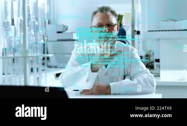 Animation of scientific data processing over caucasian male scientist ...