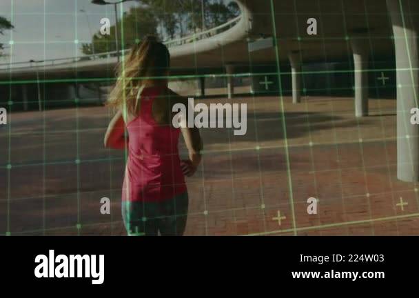 Running woman in park with fitness tracking animation over her. jogging ...
