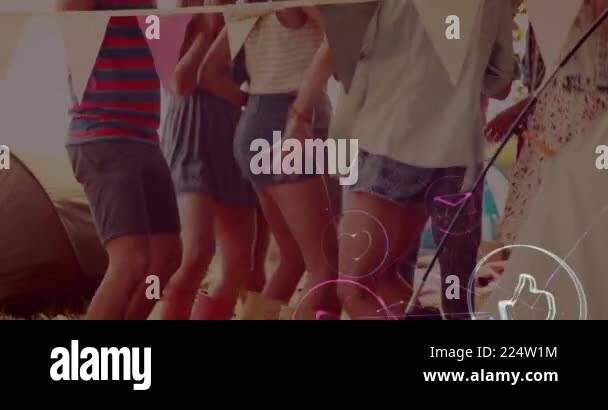 Dancing people at outdoor event with social media interaction animation ...