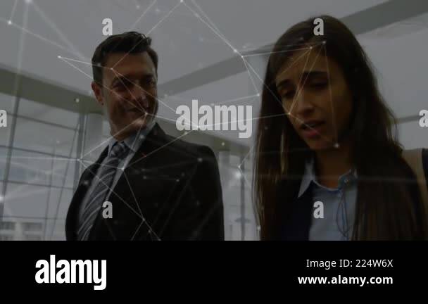 Network connections animation over business professionals walking in ...