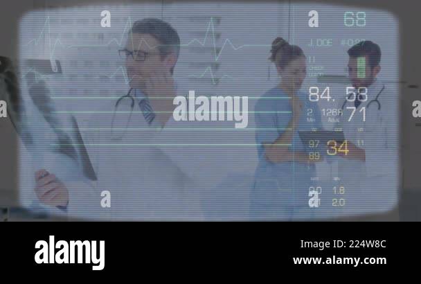Medical data and vital signs animation over doctors in hospital setting ...