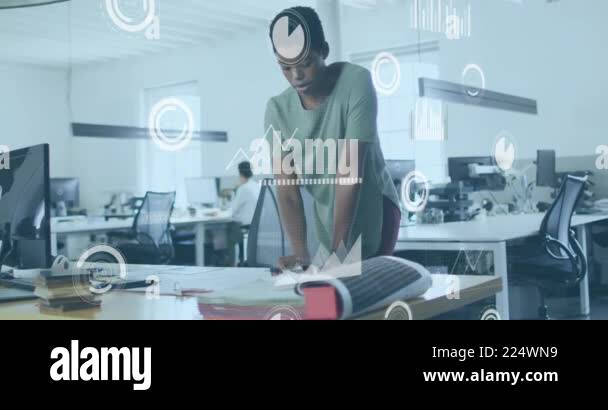 Analyzing data and charts animation over diverse business people in ...