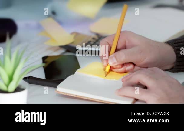 finished project hand write sticky note done word home office table ...