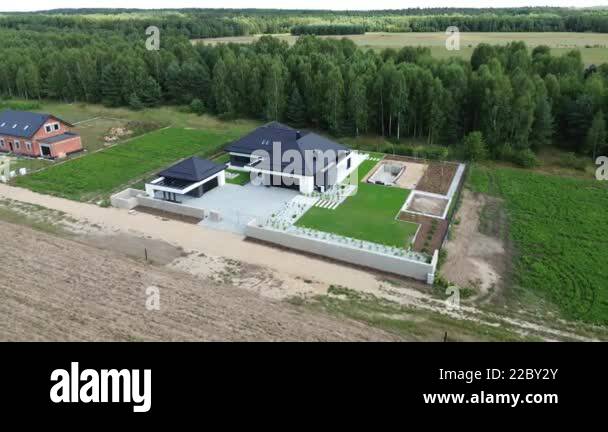 Incomplete house in open field Stock Video Footage - Alamy