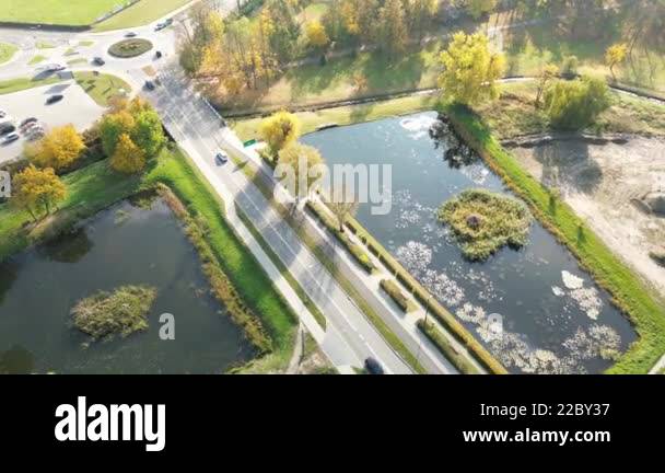 Overhead view road between two ponds autumn Stock Video Footage - Alamy