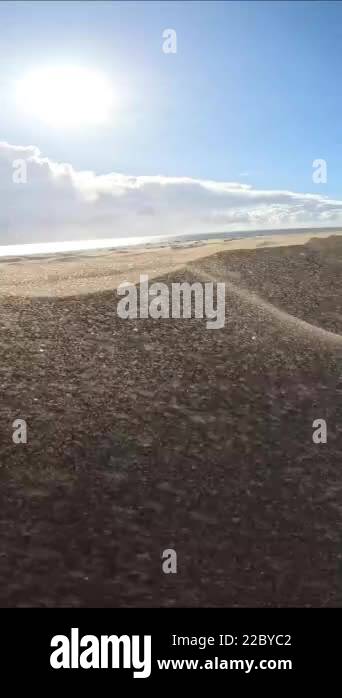 Witness the mesmerizing movement of sand as it flies through the wind ...