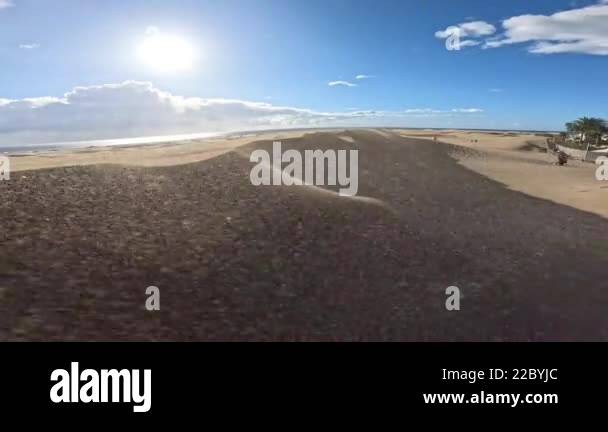 Winds sweep through the Gran Canaria desert, sending sand particles ...