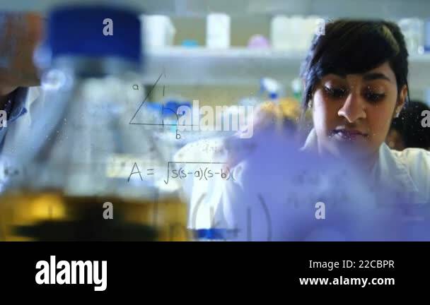 Animation of mathematical equations and dna strand over biracial female ...