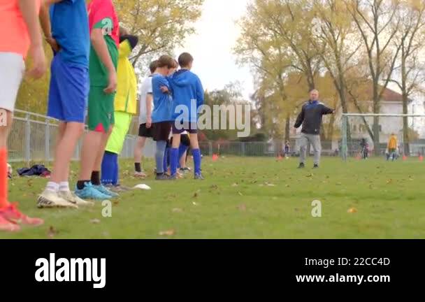 Youth soccer players engage in training sessions under the guidance of ...