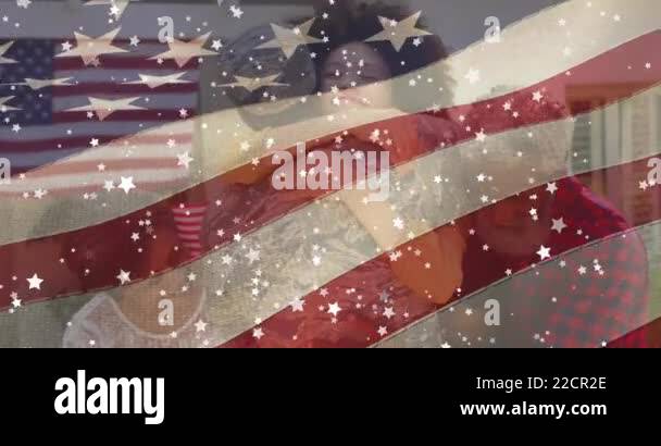 Animation of flag of usa and stars over african american male soldier ...