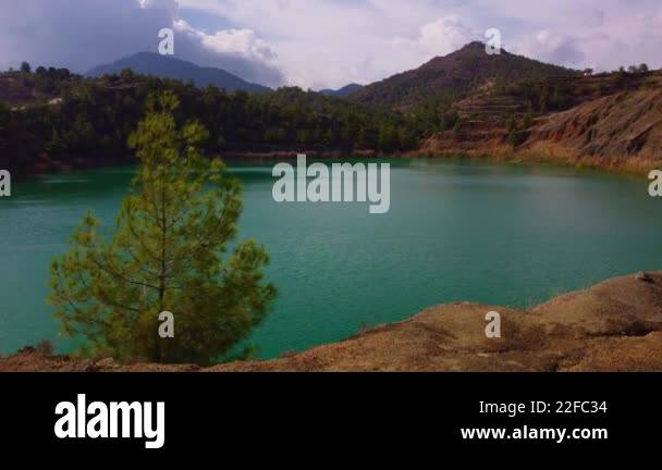 Mountain aerial view green red lake cyprus troodos Stock Video Footage ...