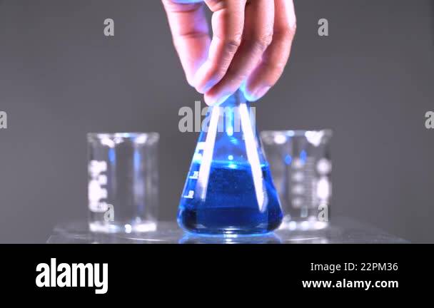Chemical experiment with colorful solutions. Formulation, cure ...