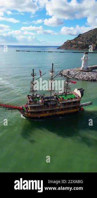 seaport lighthouse ships tourist pirate ship drone view fpv. High ...