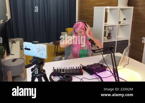 Beautiful young singer and modern musician broadcast from her home ...