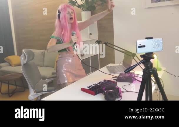 Beautiful young singer and modern musician broadcast from her home ...