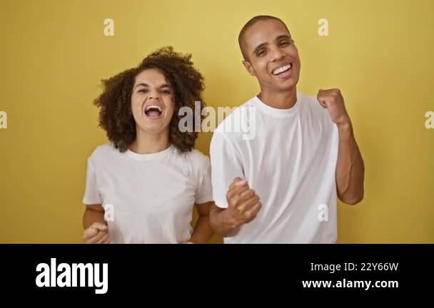 Joyful, love-struck couple celebrating their win! beautiful duo ...