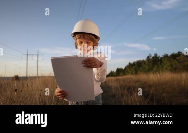 Preschool boy as engineer or manager with safety helmet. Job in ...