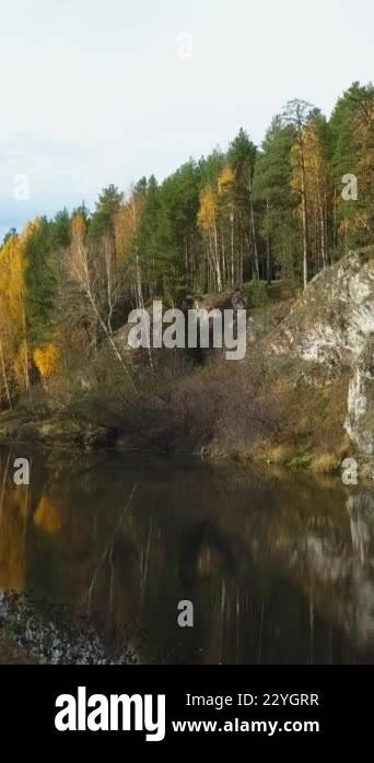 Stunningly beautiful autumn scenery showcases a tranquil river along ...