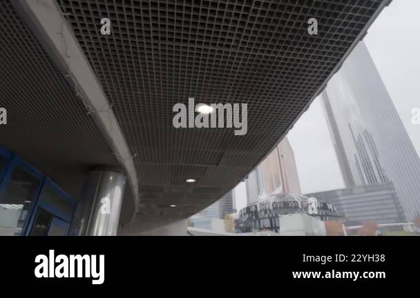 This showcases a unique perspective of urban architecture with a curved ...