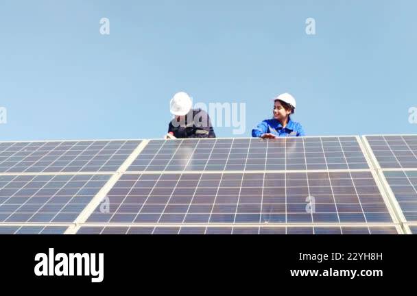 Happy high fives of electrical engineers, smart men and women work as a ...