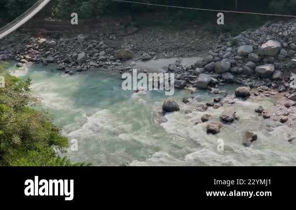 Gushing green waters of the Kali river on the way to Adi Kailash in ...