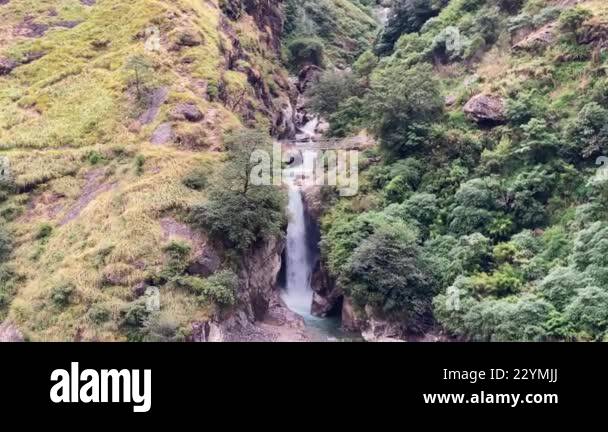 beautiful waterfall and confluence on the kali river on the way to adi ...
