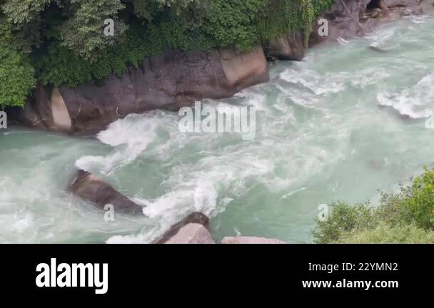 Gushing green waters of the Kali river on the way to Adi Kailash in ...