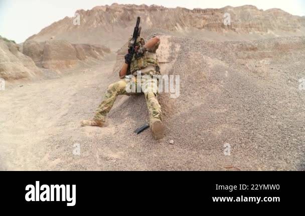 Action soldiers carry sniper rifles to fight protect maintain peace and independence along ...