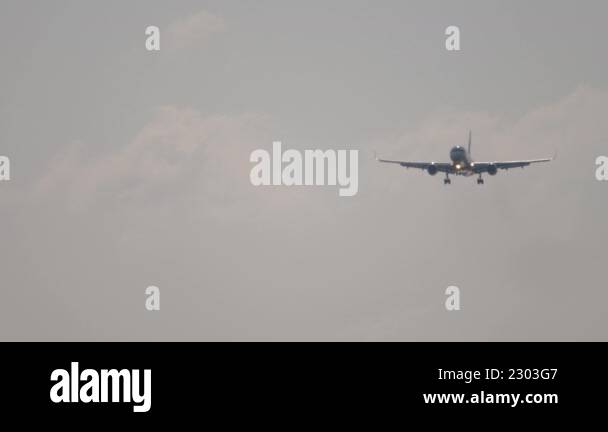 Footage of airliner approaching landing, front view. Jet plane with ...