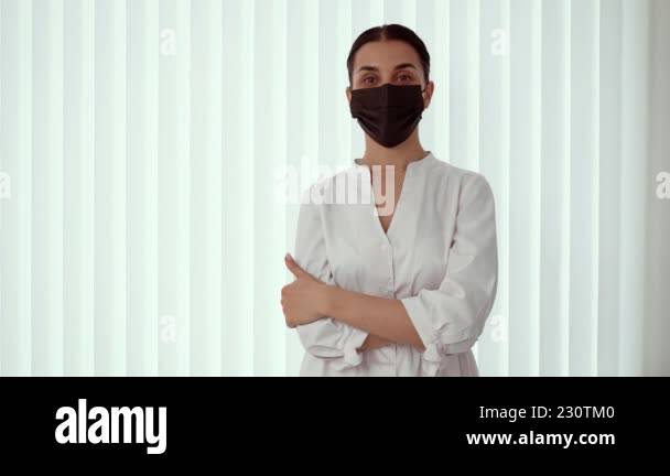 Beautician smiling confidently in advanced aesthetics studio. Female ...