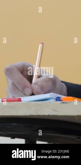 Student Write Paper Desk, student in exam stock image, studying, taking ...