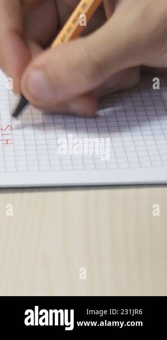 Student History desk, student taking notes in notebook, writing in ...