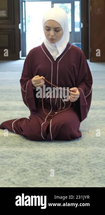 Muslim Girl Glorify In Mosque, counting beads with ones fingers ...