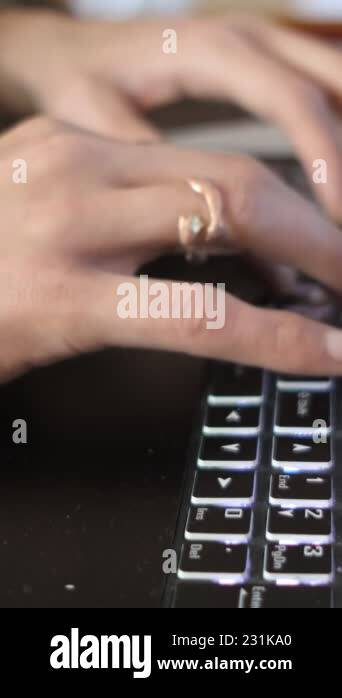 Image of hands hovering over keyboard, typing on computer letters ...