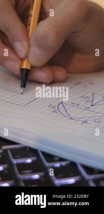 The concept image of solving math on a notebook sheet, drawing ...