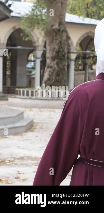 Muslim Tourist Visit Mosque, The hijab girl walking in the mosque ...