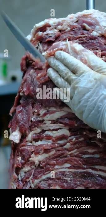 Raw doner ,meat cut into shape, cutting hanging doner, turkish street ...