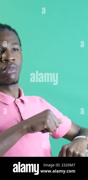Young man dancing cheerfully, black male showing dance moves, dancing ...